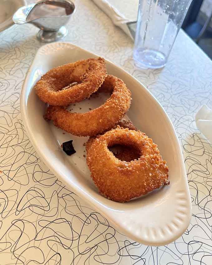 Onion rings with that perfect golden crust, ready to restore your faith in fried food everywhere.