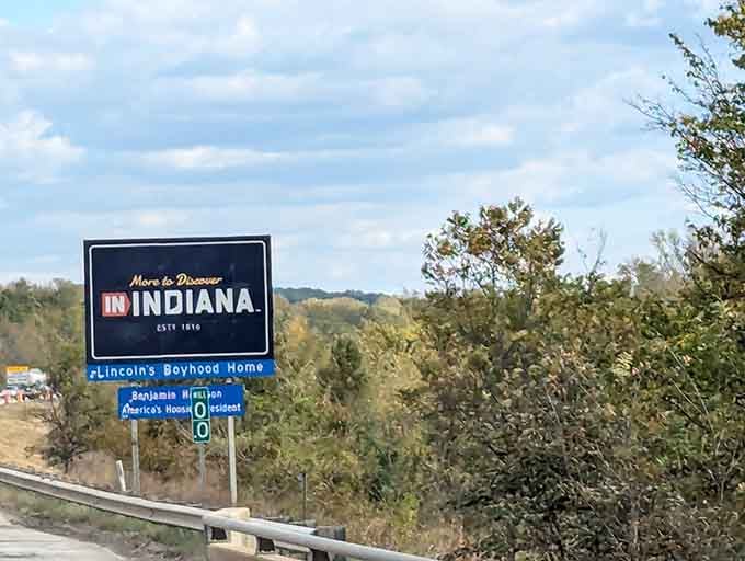 Trees frame this welcome like nature's own picture frame, making the moment even more Instagram-worthy than it already was.