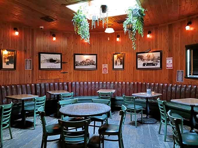 The curved banquette follows the barrel's shape, creating cozy nooks perfect for lingering over bottomless mimosas and good conversation.