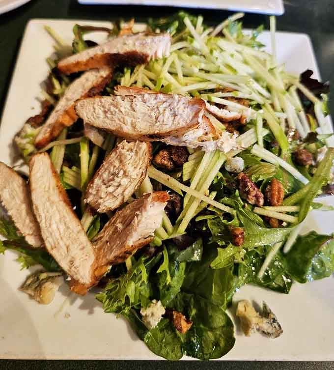 Fresh greens topped with sliced steak create a salad substantial enough to satisfy even the most dedicated carnivores.