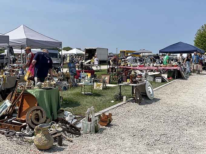 Outdoor vendors line the pathways under colorful canopies, creating a festival atmosphere that makes shopping feel like an adventure.