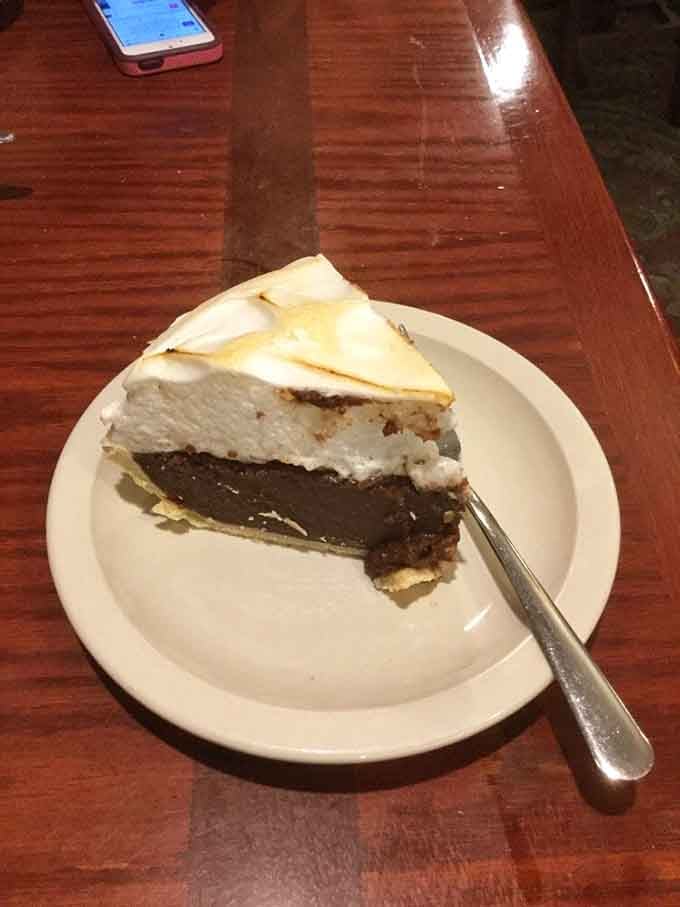 Chocolate cream pie topped with meringue peaks that would make any grandmother nod approvingly, maybe even a little jealously.