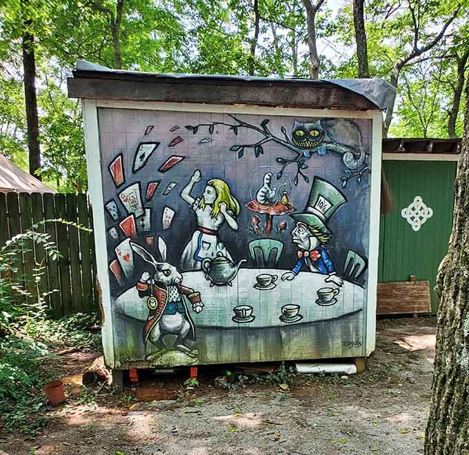 Alice's tea party comes alive in this clever mural, blending Lewis Carroll's wonderland with medieval fair charm perfectly.