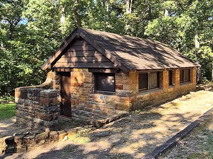 This rustic stone cabin stands as a testament to craftsmanship and simpler times gone by.