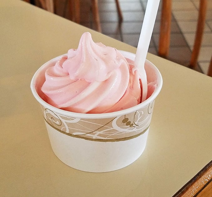 Pretty pink strawberry soft serve swirled into a cup, proving the "Kone" part of the name is just as important.