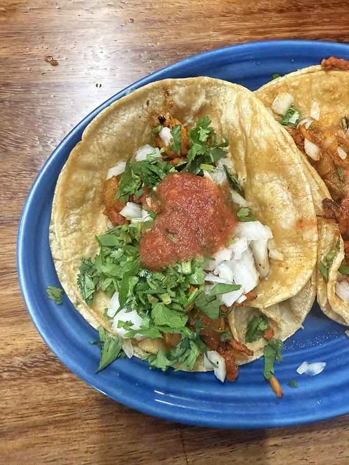 Street tacos topped simply with cilantro and onions prove that sometimes less really is spectacularly more than enough.