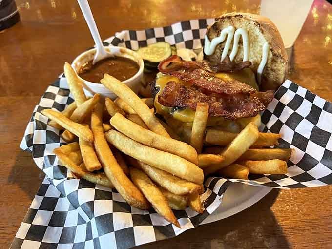 This double cheeseburger and fries combo is pure comfort food poetry, served in a checkered basket of joy.