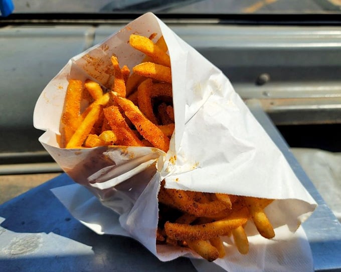 Garlic butter fries that look like they've been blessed by Mediterranean flavor gods and a deep fryer.