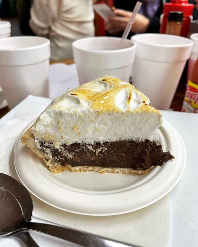 Chocolate pie with meringue tall enough to have its own weather system and dreams of Broadway stardom.
