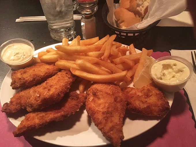 Breaded cod with fries proves that sometimes the best surf and turf is just surf twice.