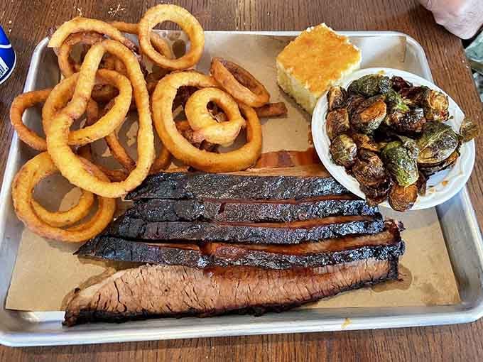 This beef brisket platter at Local Smoke BBQ showcases the kind of smoke ring that makes competition judges weep.