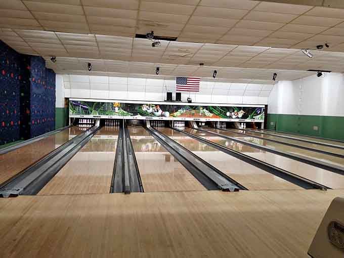 Clinton Lanes bowling alley maintains that classic aesthetic where strikes feel more satisfying under vintage lighting.