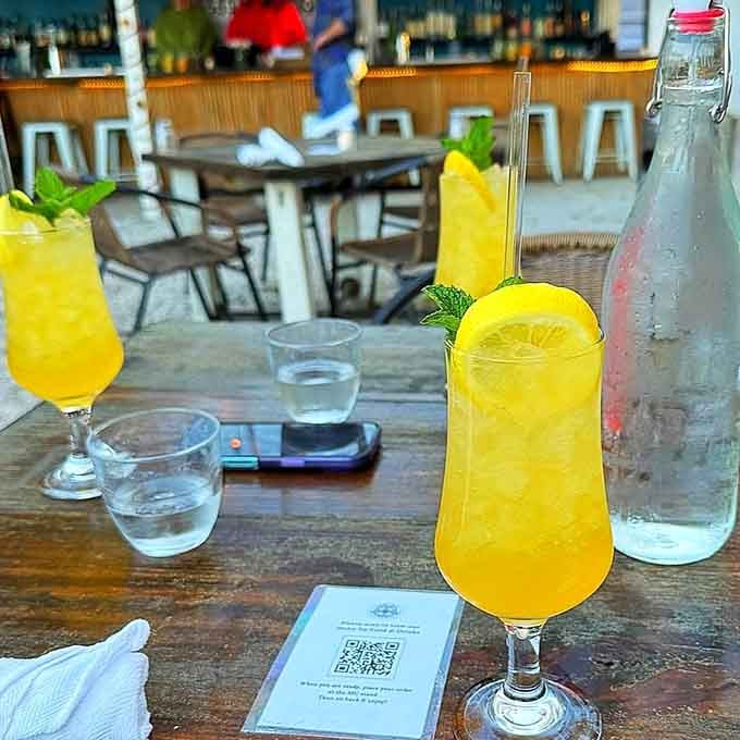 Bright, tropical cocktails that look like liquid sunshine and taste even better than they photograph on your Instagram feed.