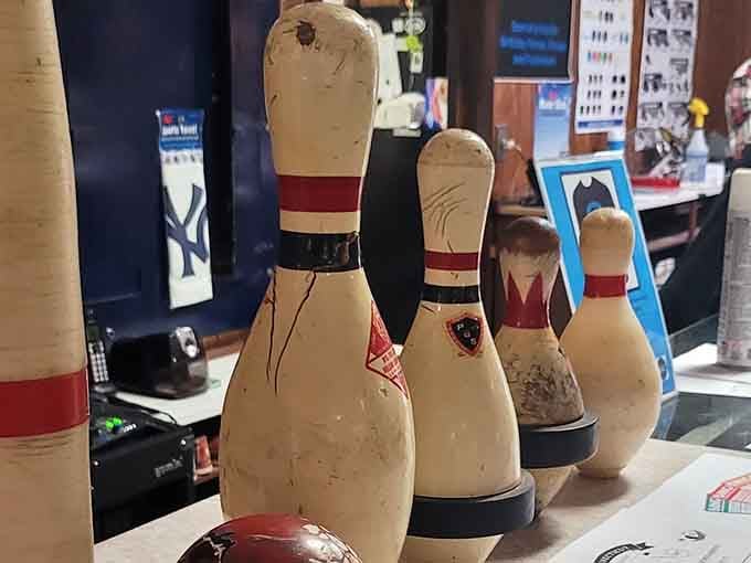 Duckpin bowling pins showing their battle scars with pride &ndash; these veterans have stories etched into every scratch.