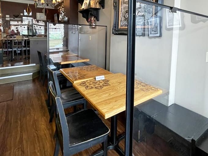 Cozy booths and wooden tables where countless breakfast conversations have solved the world's problems, probably.