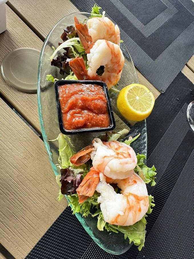 Jumbo shrimp arranged like they're posing for their close-up, because even seafood deserves its moment to shine.