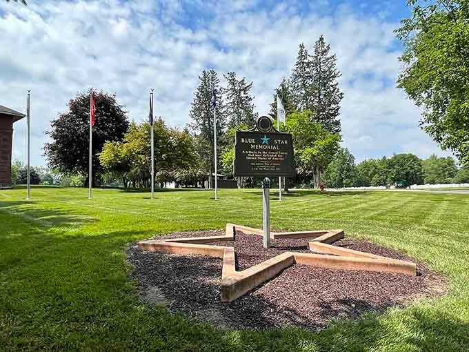 The Blue Star Memorial marker stands as a solemn reminder of service and sacrifice in Marion's peaceful cemetery grounds.
