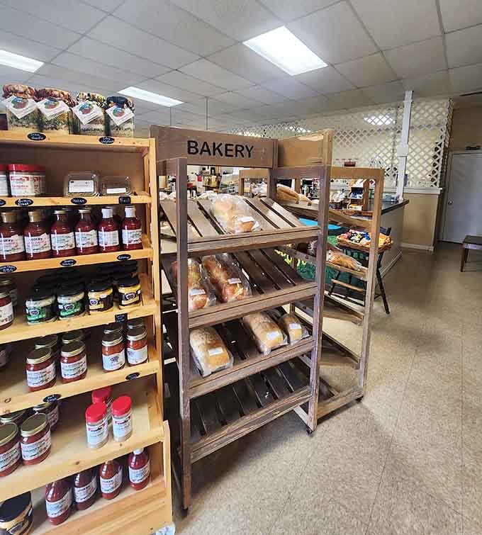 Wooden shelves lined with fresh bread loaves create a scene Norman Rockwell would have loved to paint.