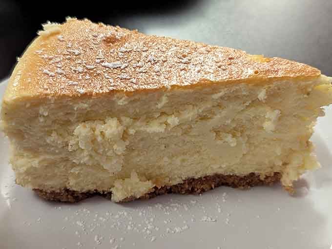 That slice of cheesecake is dense, creamy perfection&mdash;the ideal way to end your pizza pilgrimage.