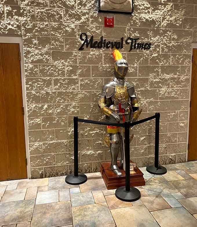 This gleaming suit of armor stands guard in the lobby, a golden sentinel welcoming guests to the realm.
