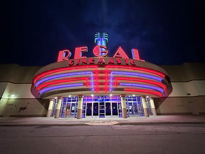 The Regal Cinema glowing like a beacon for date night&mdash;because small towns do entertainment right too.