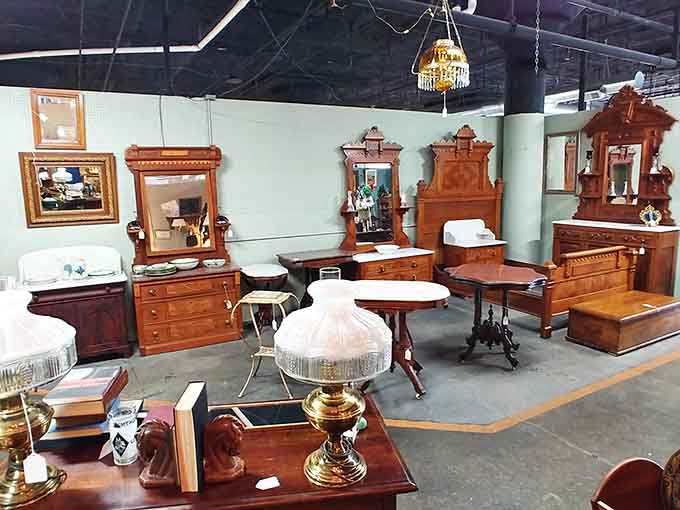 Antique dressers lined up like they're competing in a beauty pageant for furniture with the best bone structure.