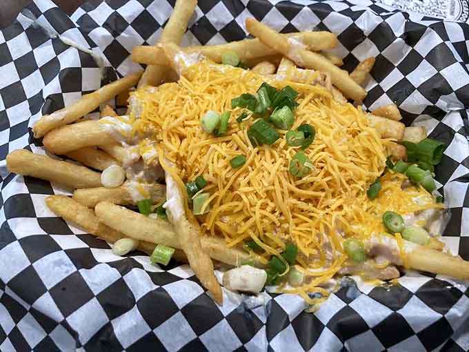 Chowder poutine topped with cheese and green onions, because why choose between comfort foods when you can combine them?