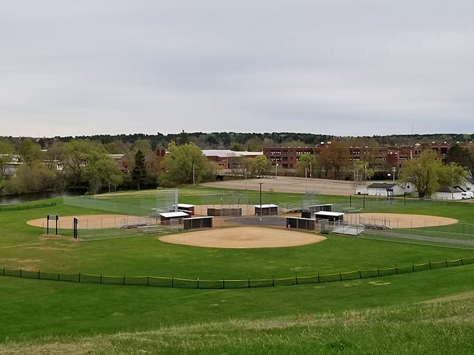 Baseball diamonds stretch across green fields, ready for America's pastime without the outrageous ticket prices plaguing professional stadiums these days.
