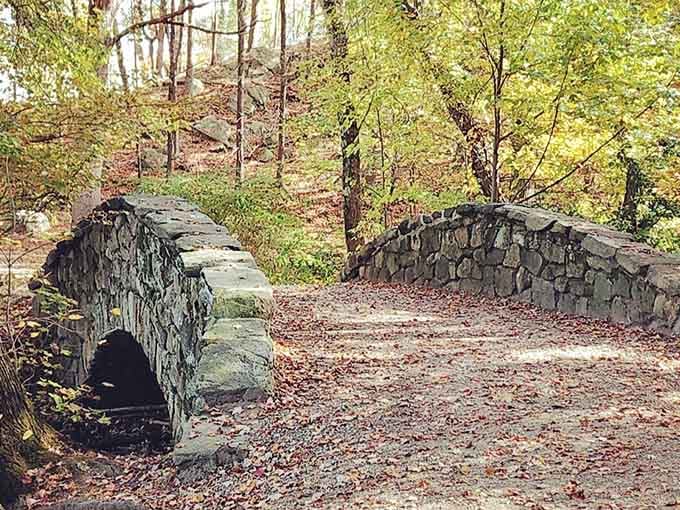 This charming stone bridge has been helping people cross streams since before GPS told us where to go.