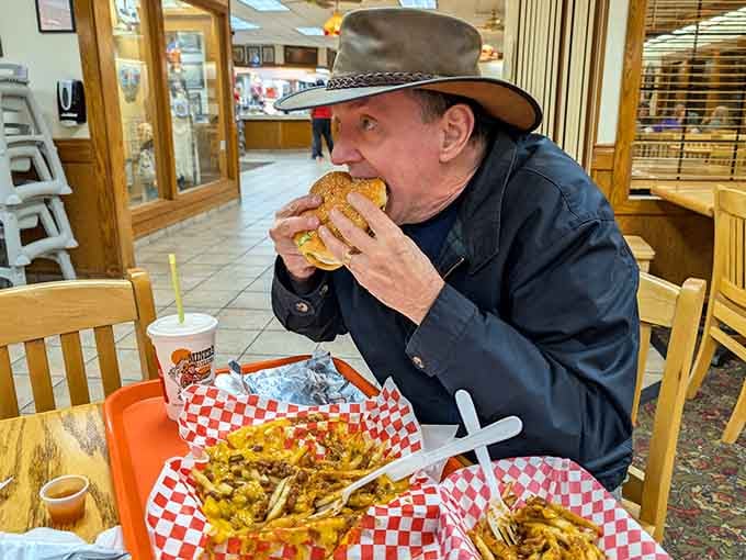 A customer tackles the challenge with the determination of someone who skipped breakfast on purpose.