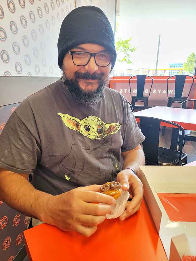 Bright orange walls and comfortable seating invite you to stay awhile and enjoy every single bite slowly.