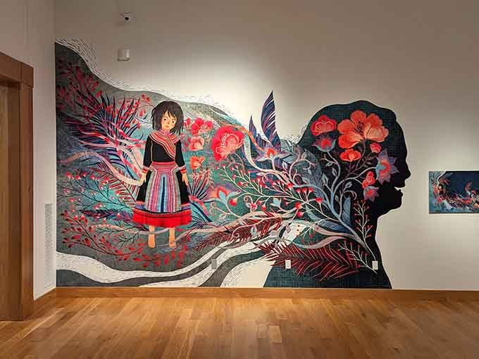 Vibrant murals transform walls into storytelling canvases where folklore and nature dance in brilliant color.