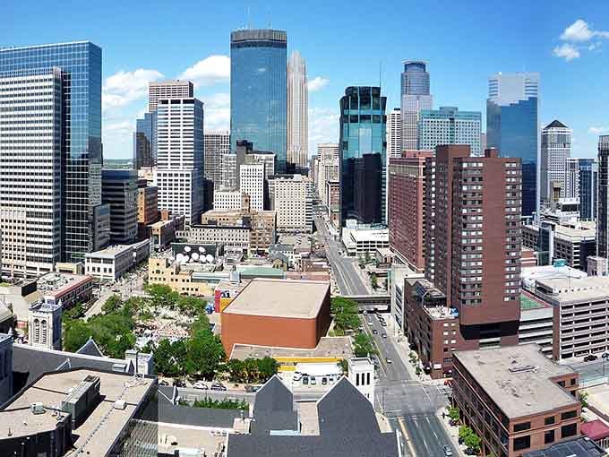 Minneapolis skyline rising like a modern marvel, reminding you what the actual state capital looks like for comparison.