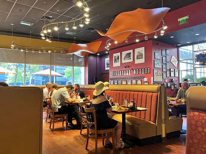 Happy diners in cozy booths, the universal sign that you've chosen your breakfast spot very wisely.