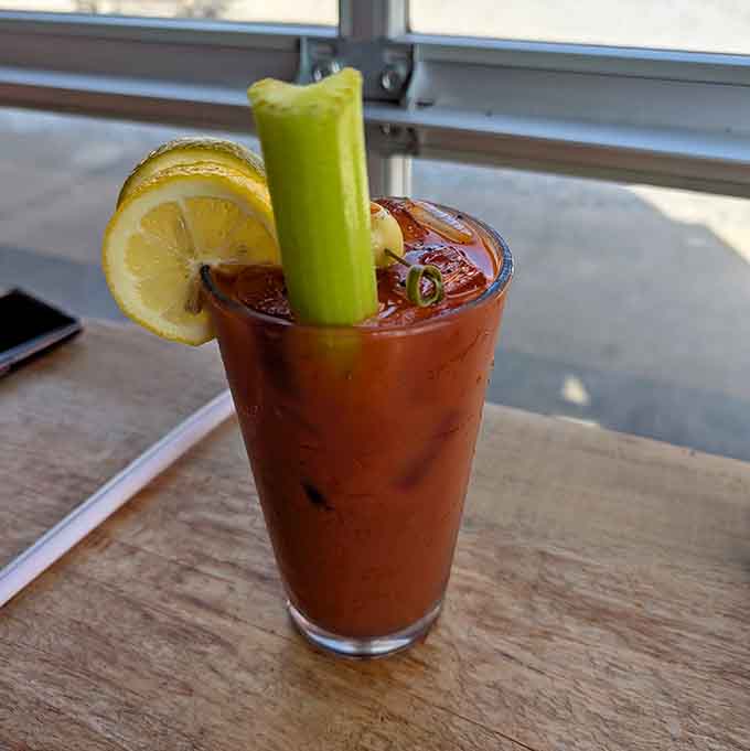 A Bloody Mary garnished with celery and lemon, ready to turn brunch into a proper celebration.