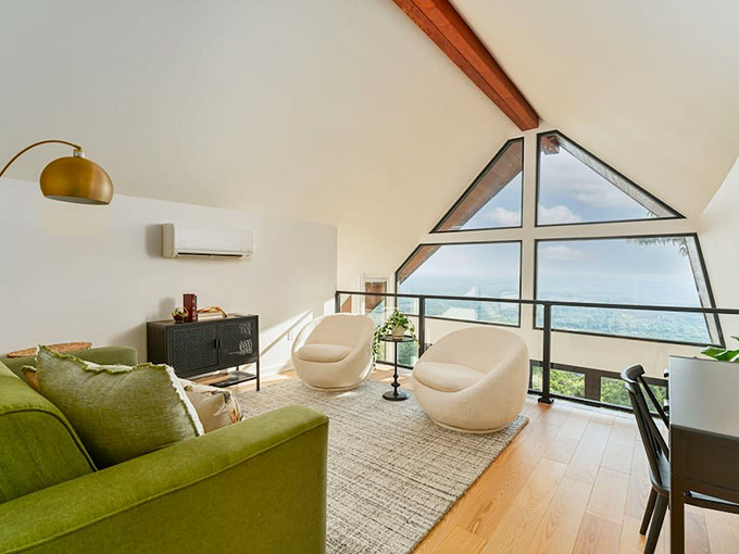 That triangular window frames views so perfect you'll forget what you were supposed to be working on.