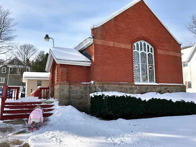 St. John's Episcopal Church wears its winter coat beautifully, proving small-town architecture has serious charm year-round.