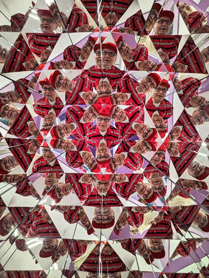 When mirrors multiply you into infinity, it's like being the star of your own kaleidoscope-themed variety show extravaganza.