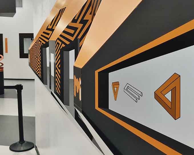 Impossible shapes line the walls like they're auditioning for an M.C. Escher tribute band's album cover.