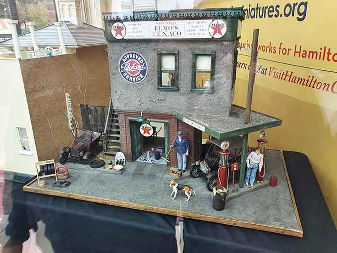 Elmo's Texaco station captures vintage Americana in miniature, complete with gas pumps and a loyal canine customer.