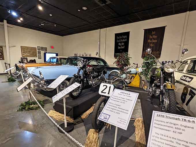 Motorcycles and vintage iron sharing space like old friends at the world's classiest garage party.