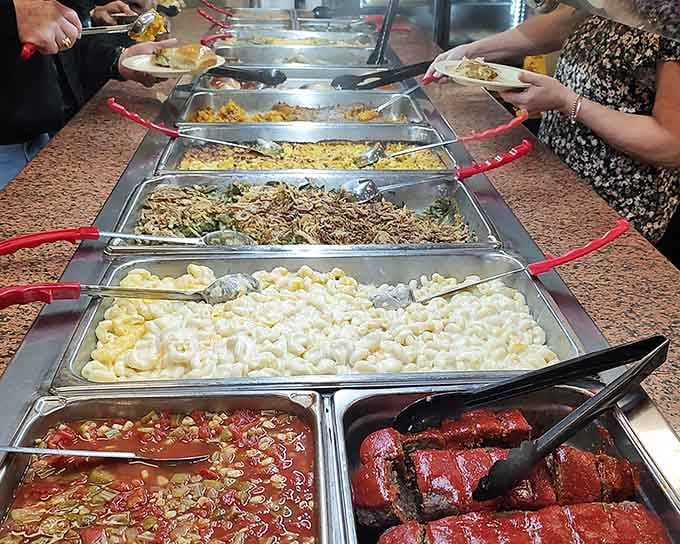 Rows of hearty Southern favorites stretch down the buffet, making every trip back feel completely justified.