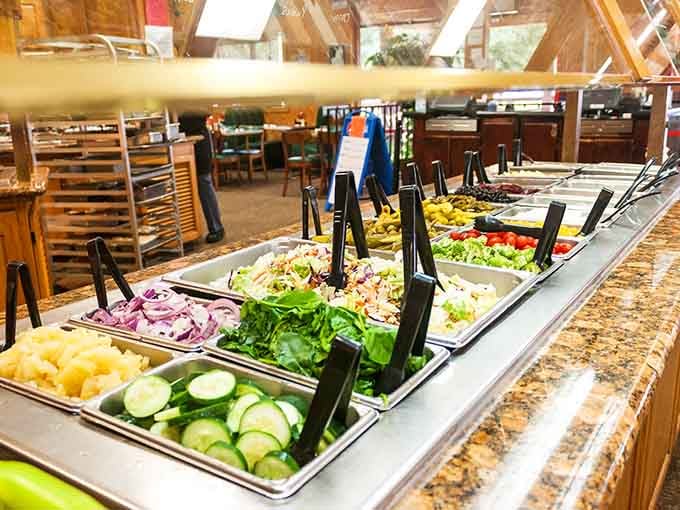 A fresh salad bar with crisp vegetables proves that even at a buffet, balance is possible&mdash;before round two.
