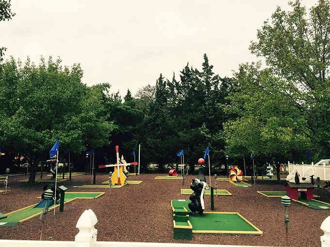 Mini golf where the only thing harder than sinking a putt is getting the kids to leave afterward.