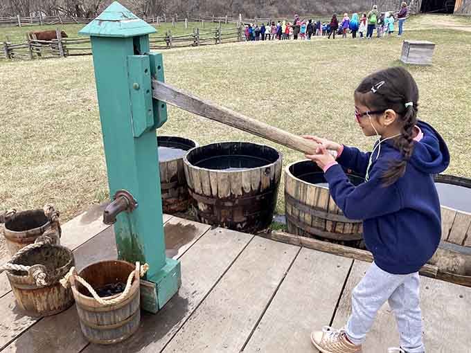 Hand-pumping water builds character and appreciation for modern plumbing faster than any lecture ever could manage.