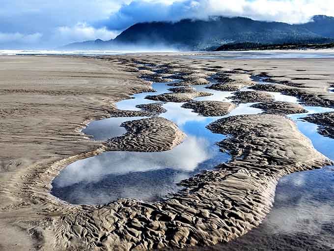 Low tide reveals nature's abstract art in sand patterns that would make any gallery jealous of the ocean.