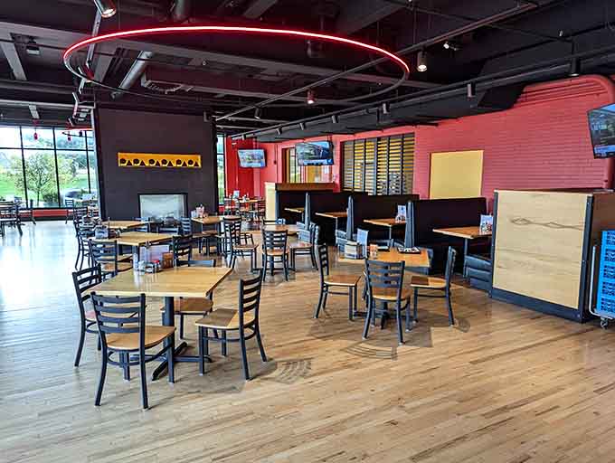 The dining room buzzes with the kind of energy that only comes from people anticipating seriously good pizza.