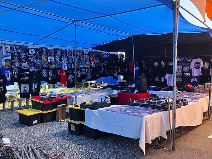 Band tees and graphic apparel hang like a concert venue merged with your favorite thrift store.