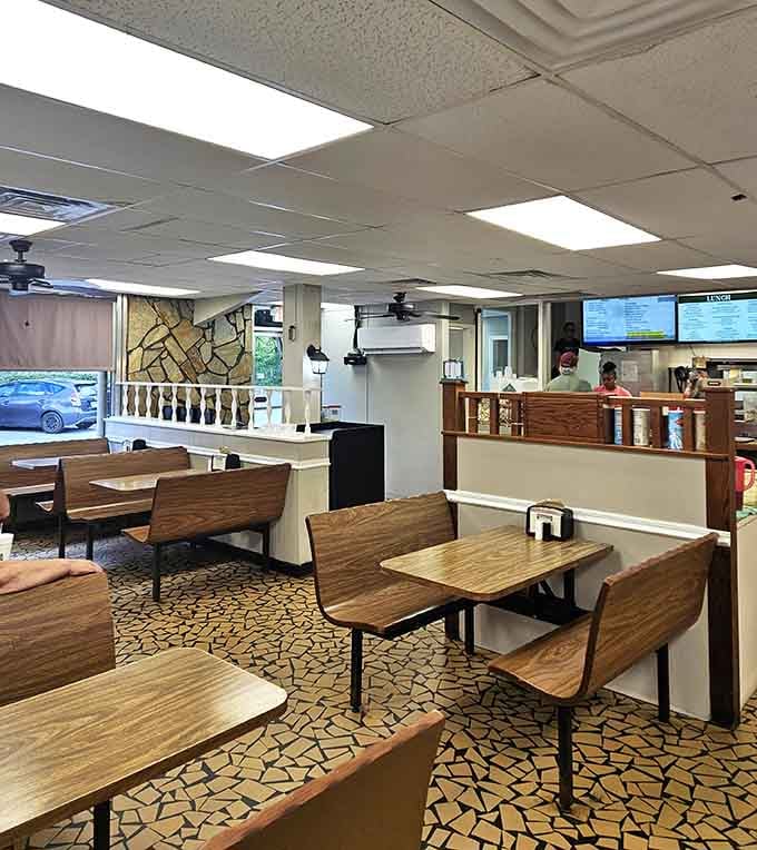 Simple booths and honest tables where good food matters more than fancy interior design ever could.