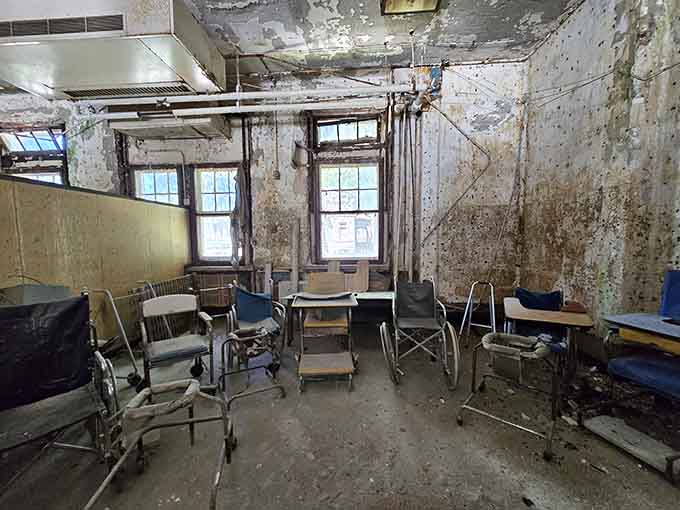 Wheelchairs and peeling paint preserve a moment frozen in time, uncomfortable but historically significant.